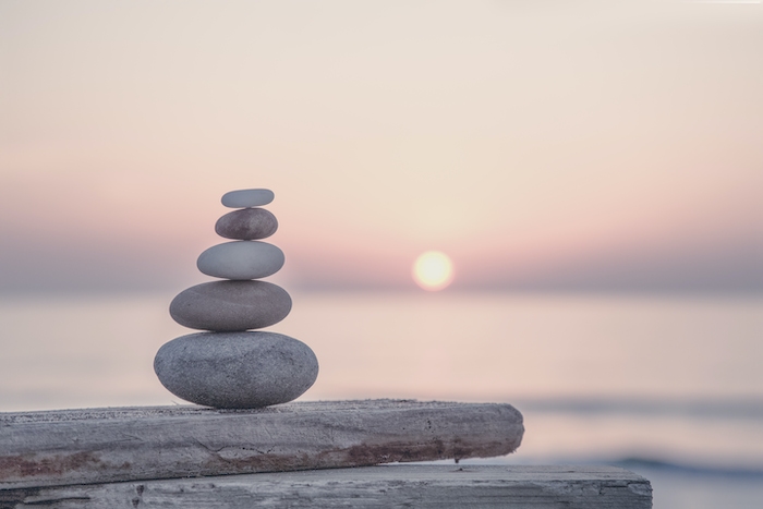 Stone Cairn at Seaside Sunset Wallpaper - Happywall