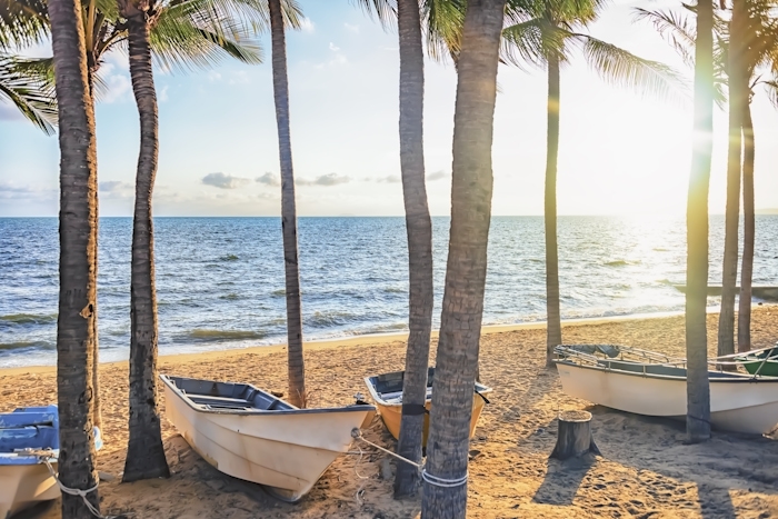 Tropical Beach Scene Wallpaper with Boats